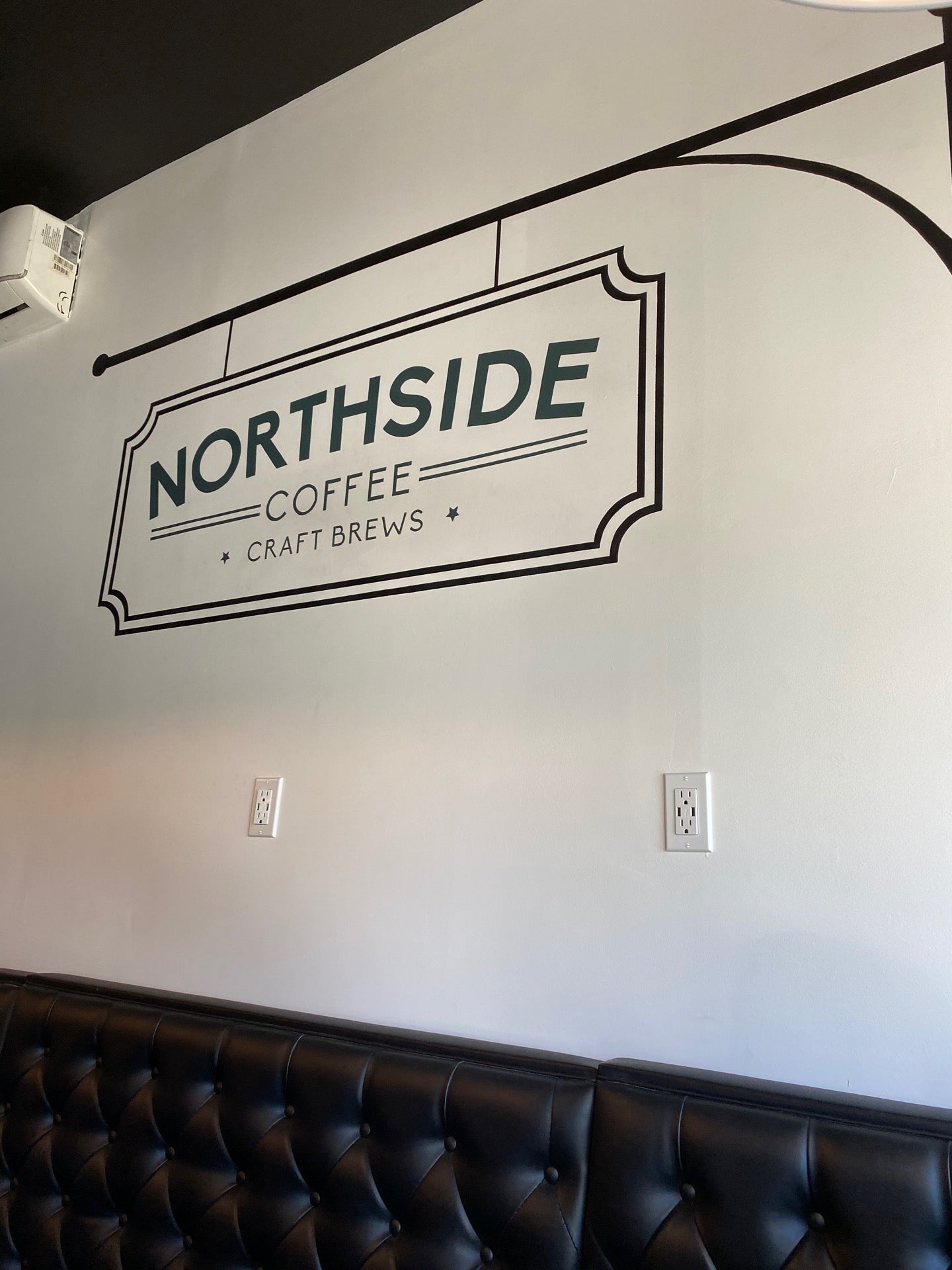 Northside Sign With Hand