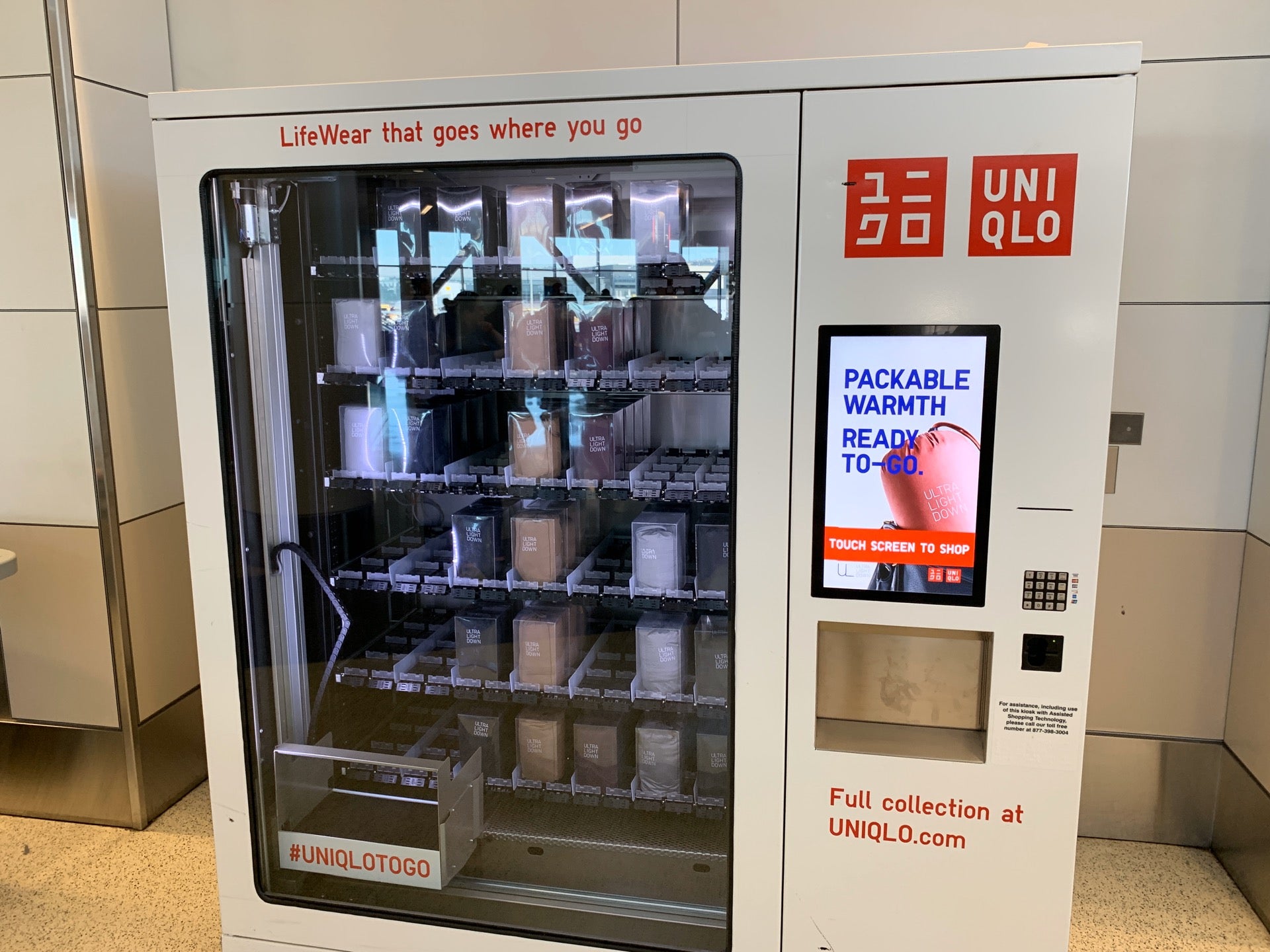 Uniqlo Vending Machine, Terminal 2, San Francisco, CA, Clothing Retail ...